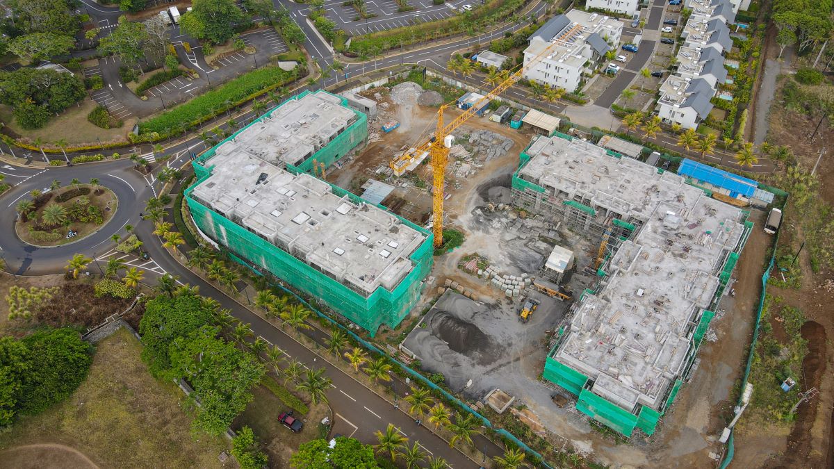 How is the construction of the future Indigo Apartments progressing?